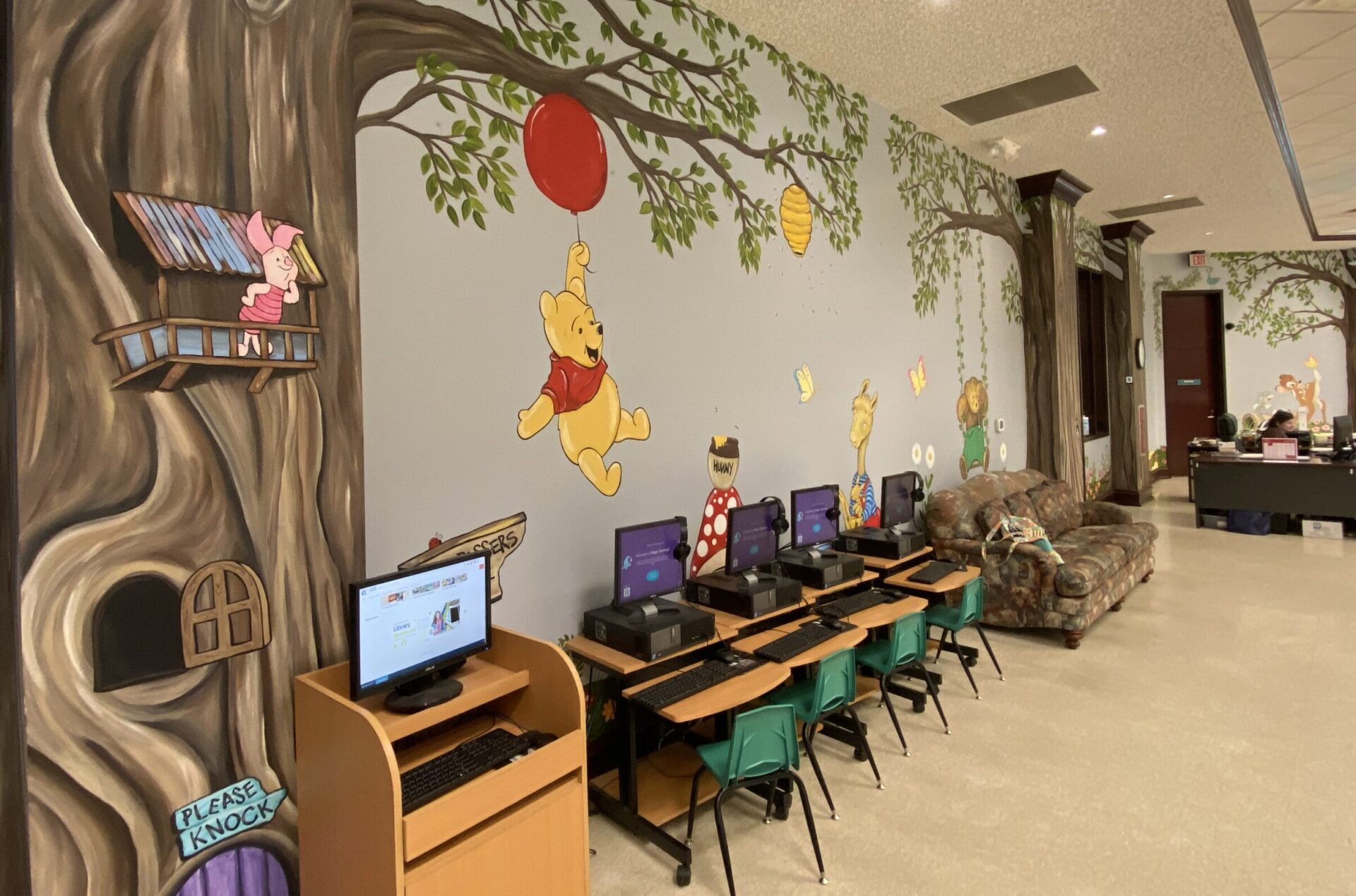 Murals transform Minden library Children’s Room into storybook ...