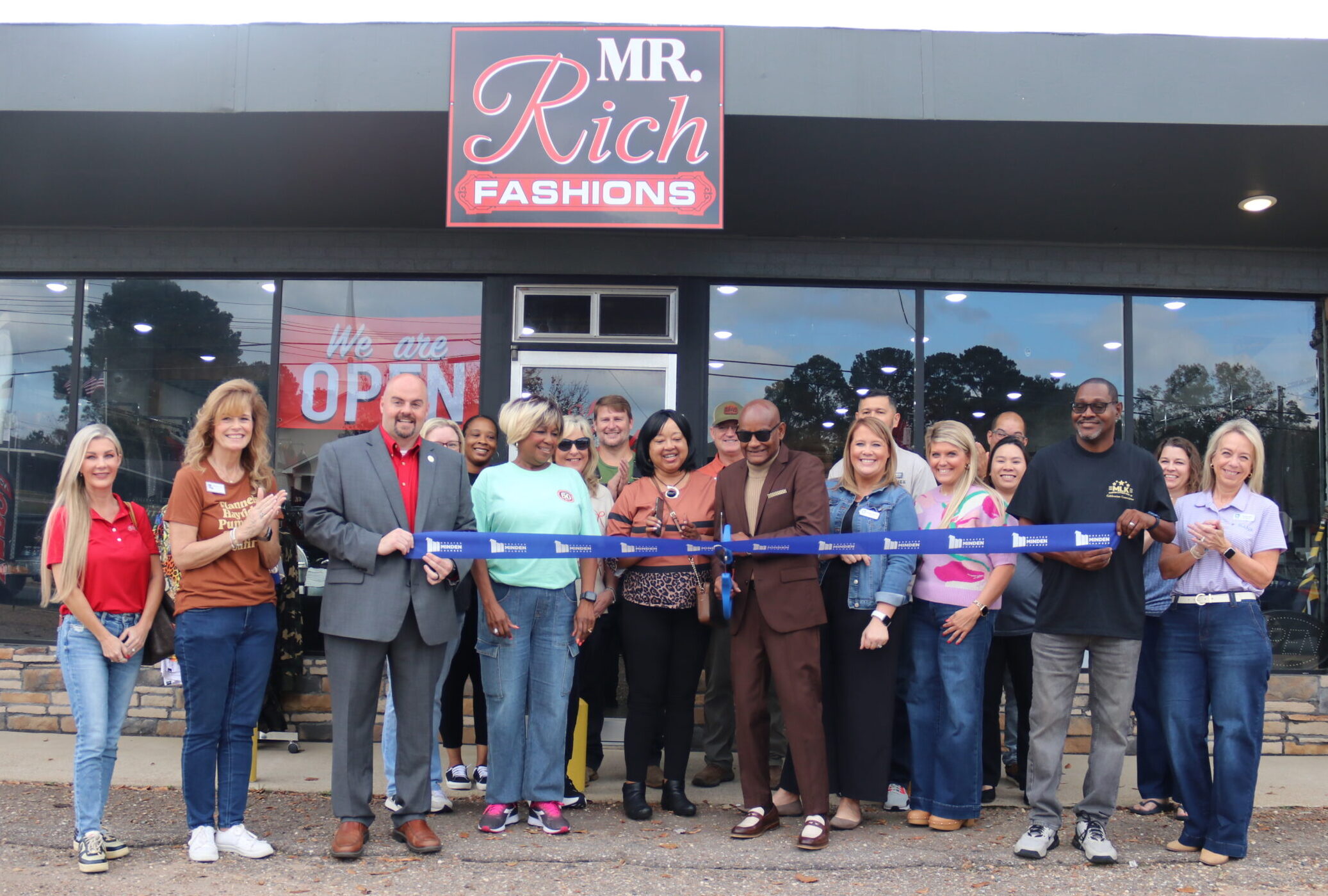 Ribbon cutting held for Mr. Rich Fashions – Minden Press-Herald